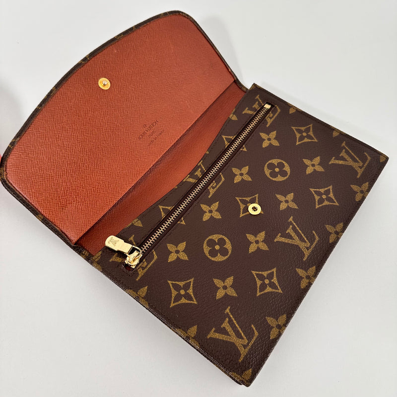 Louis Vuitton - Monogram Clutch – The Reluxed Collection